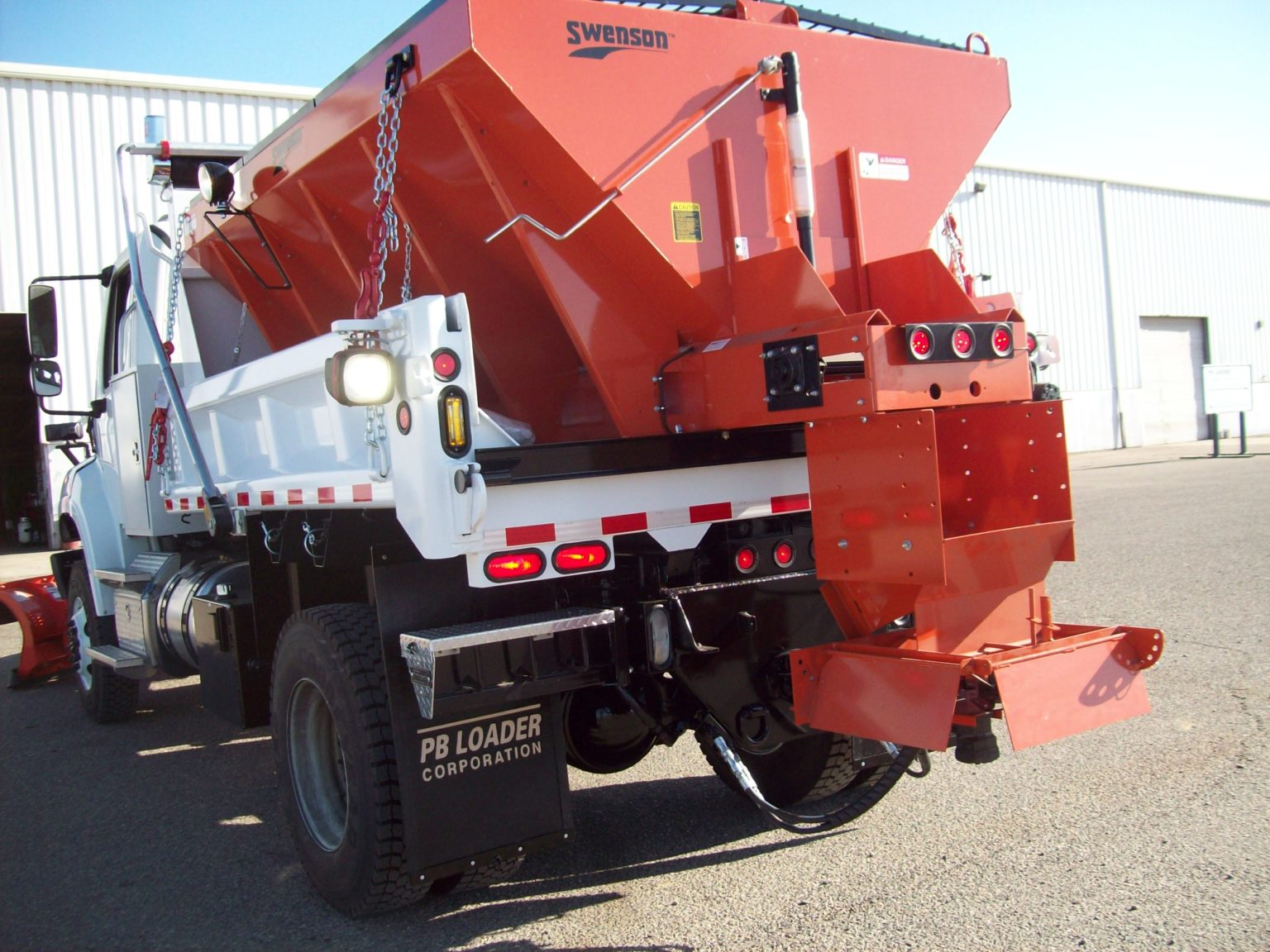 Plows & Sanders – PB Loader